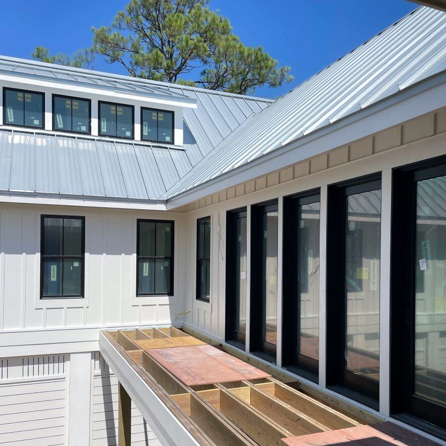 Enhancing Our Coastal Home with a Metal Roof: Durability Meets Elegance