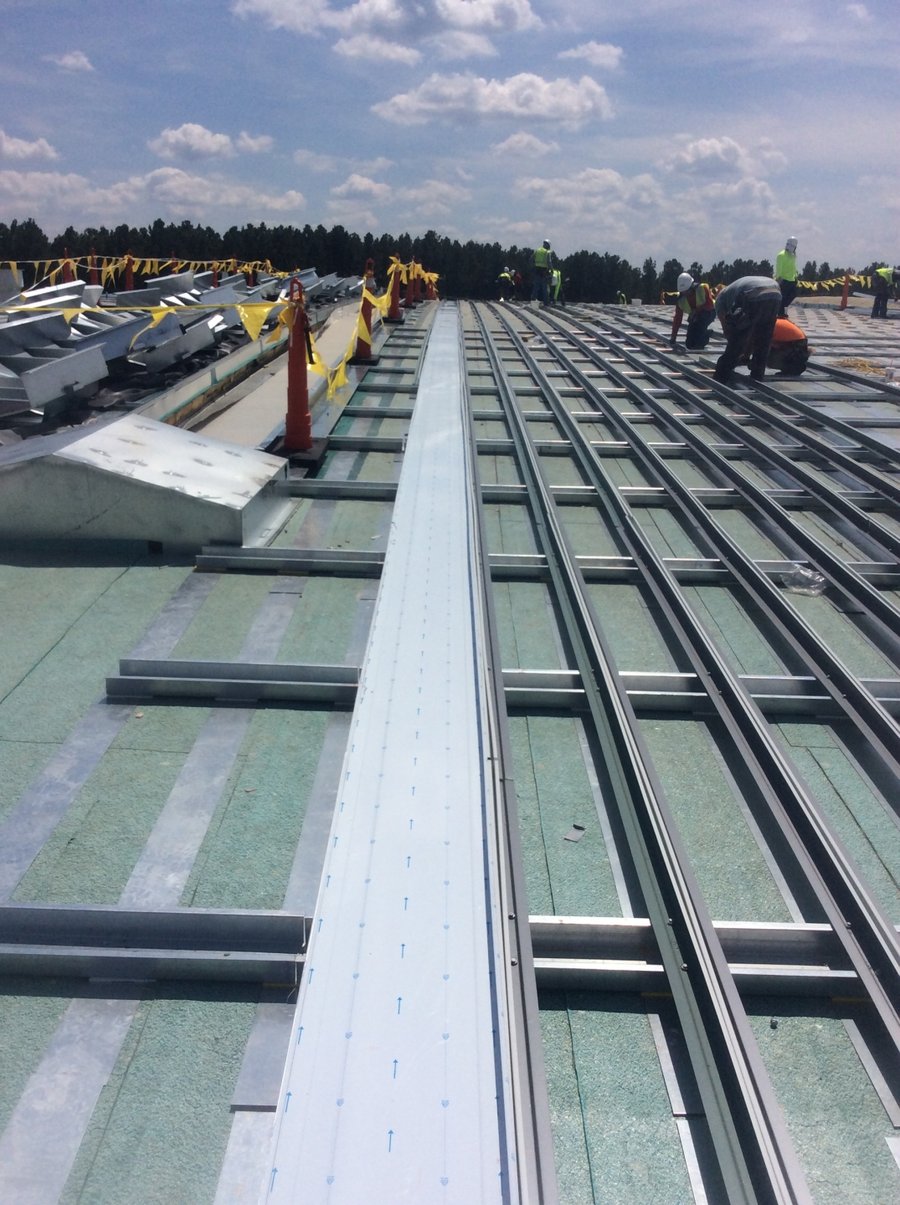 Rollforming Long Standing Seam Metal Roof Panels Onsite