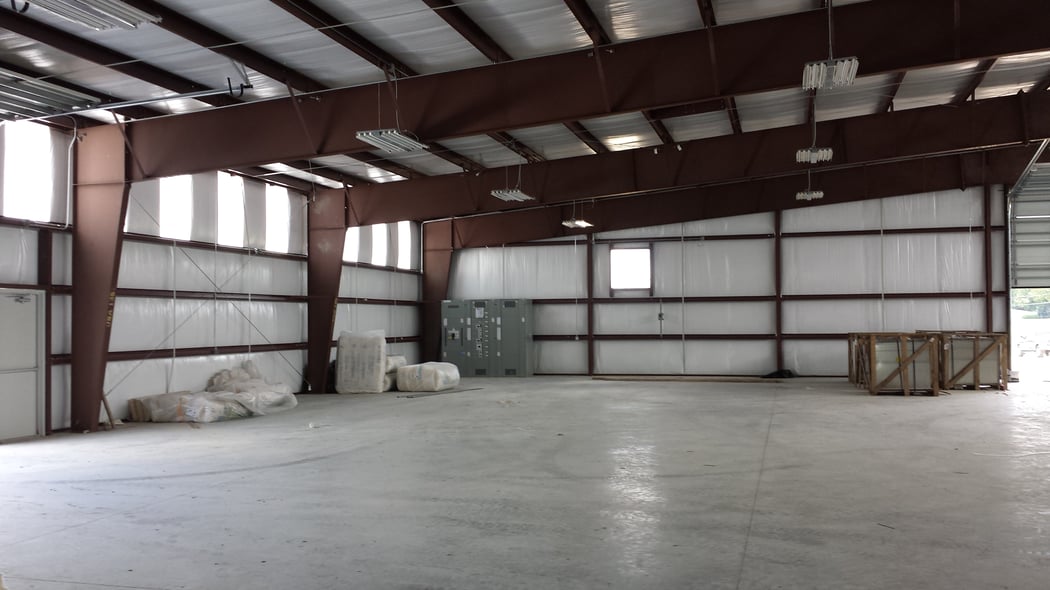 Installing a Membrane Roof over a Metal Roof on a Pre-Engineered Metal ...